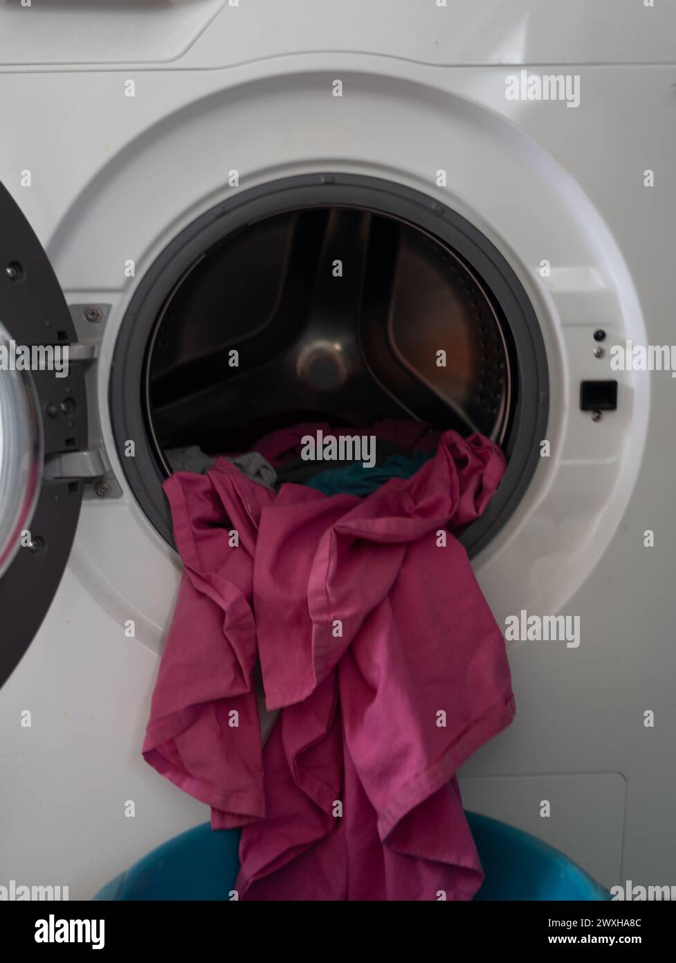 Washing machine with clothes hi-res stock photography and images - Alamy