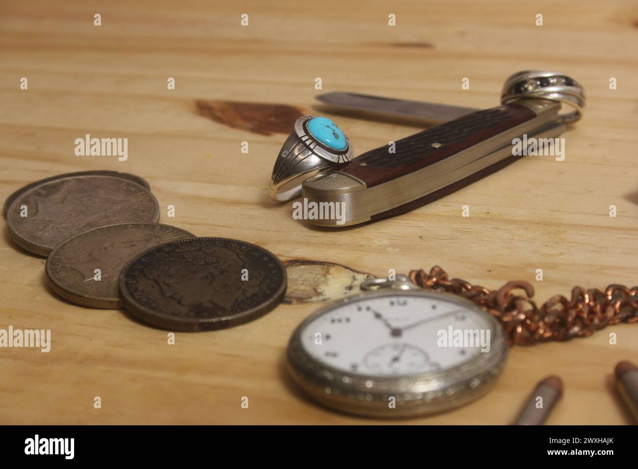 Folding knife coin hi-res stock photography and images - Alamy