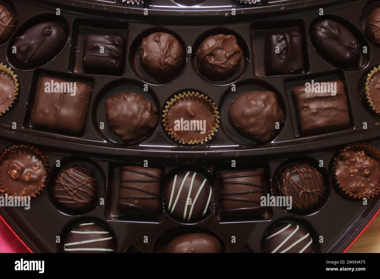 Box of chocolates on a table Stock Photo - Alamy