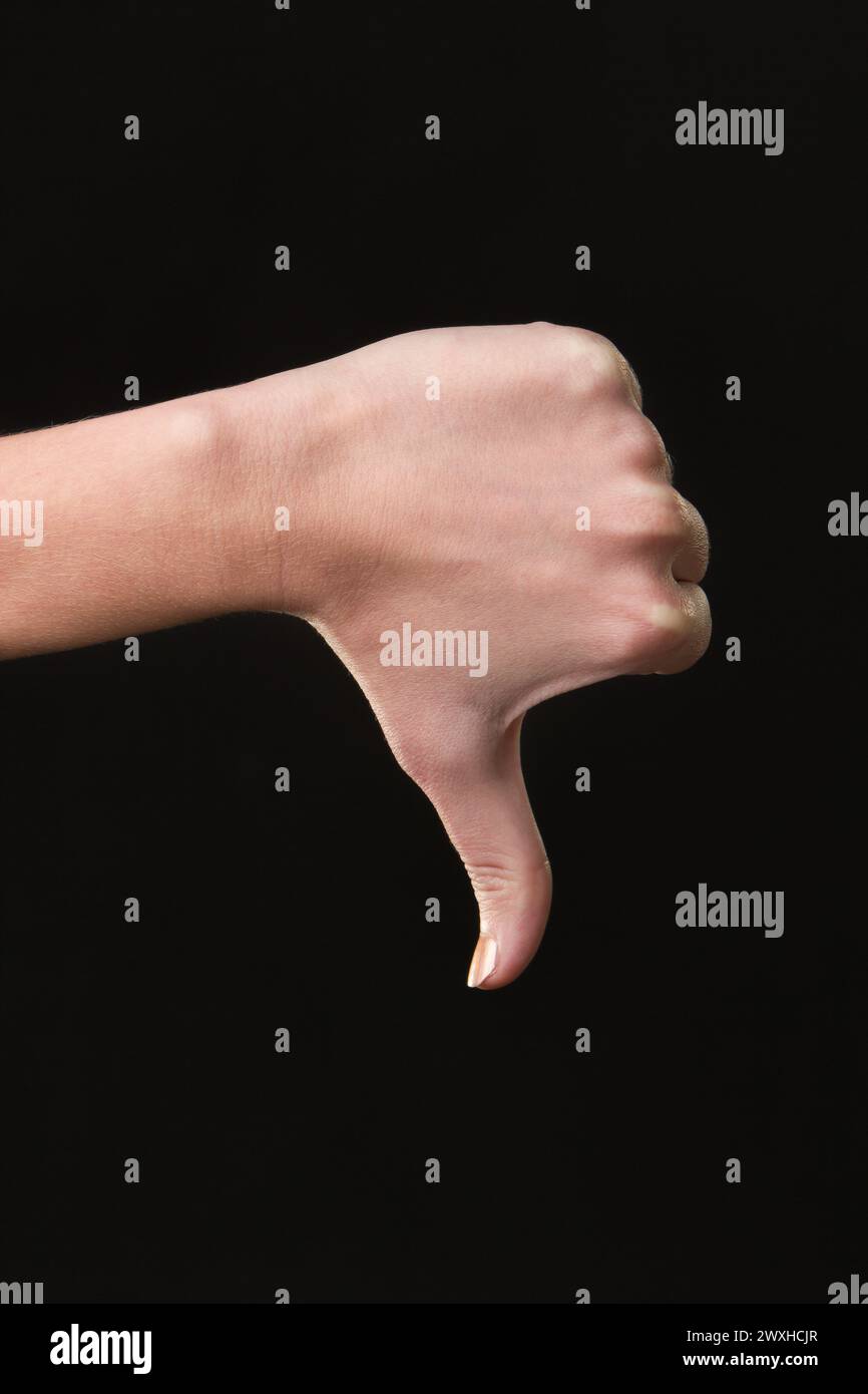Hand sign thumb up down hi-res stock photography and images - Alamy