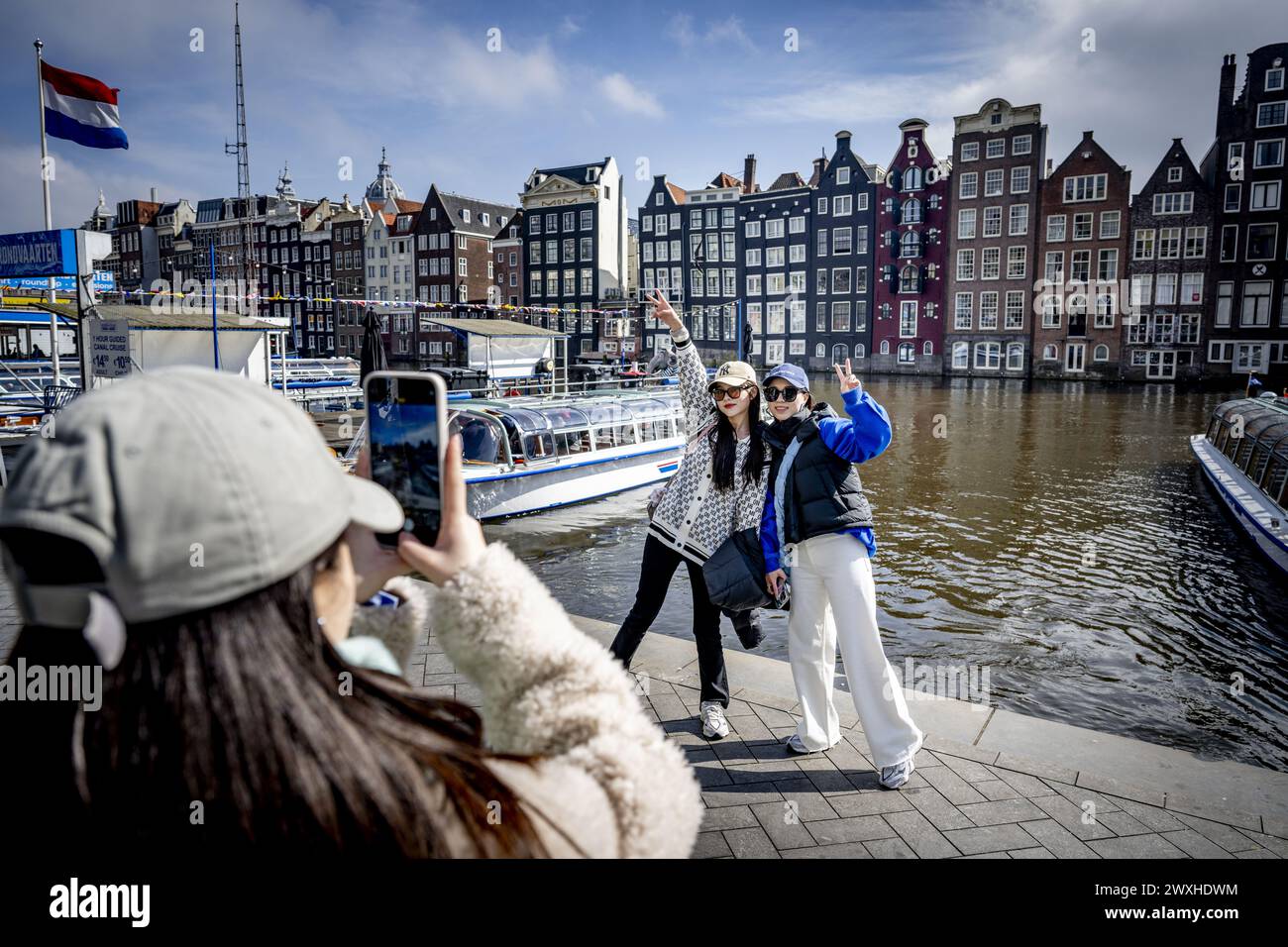 Tourists in the center on Easter Sunday in Amsterdam, The Netherlands ...