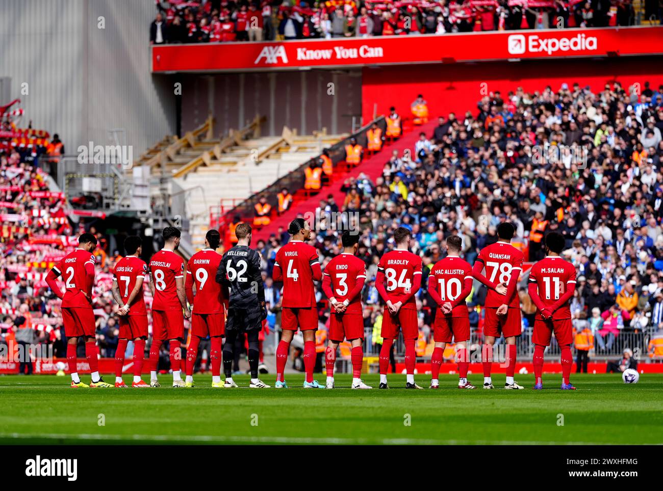 Players and fans observe a minute's silence in memory of former ...