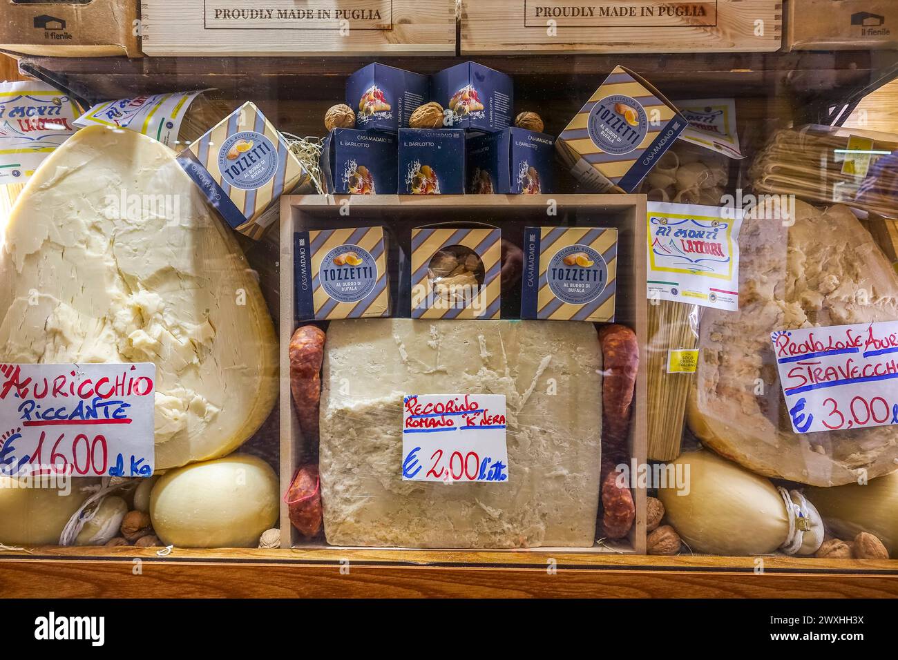 Italian cheese displayed at food shop in Naples, Ai Monti Lattari ...