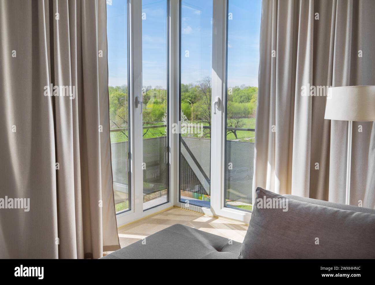 Corner window to the floor in the living room Stock Photo - Alamy