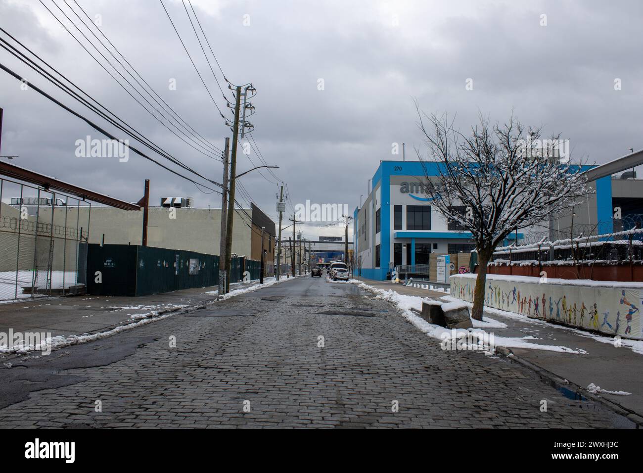 Red stop sign on snowy ground Stock Photo - Alamy