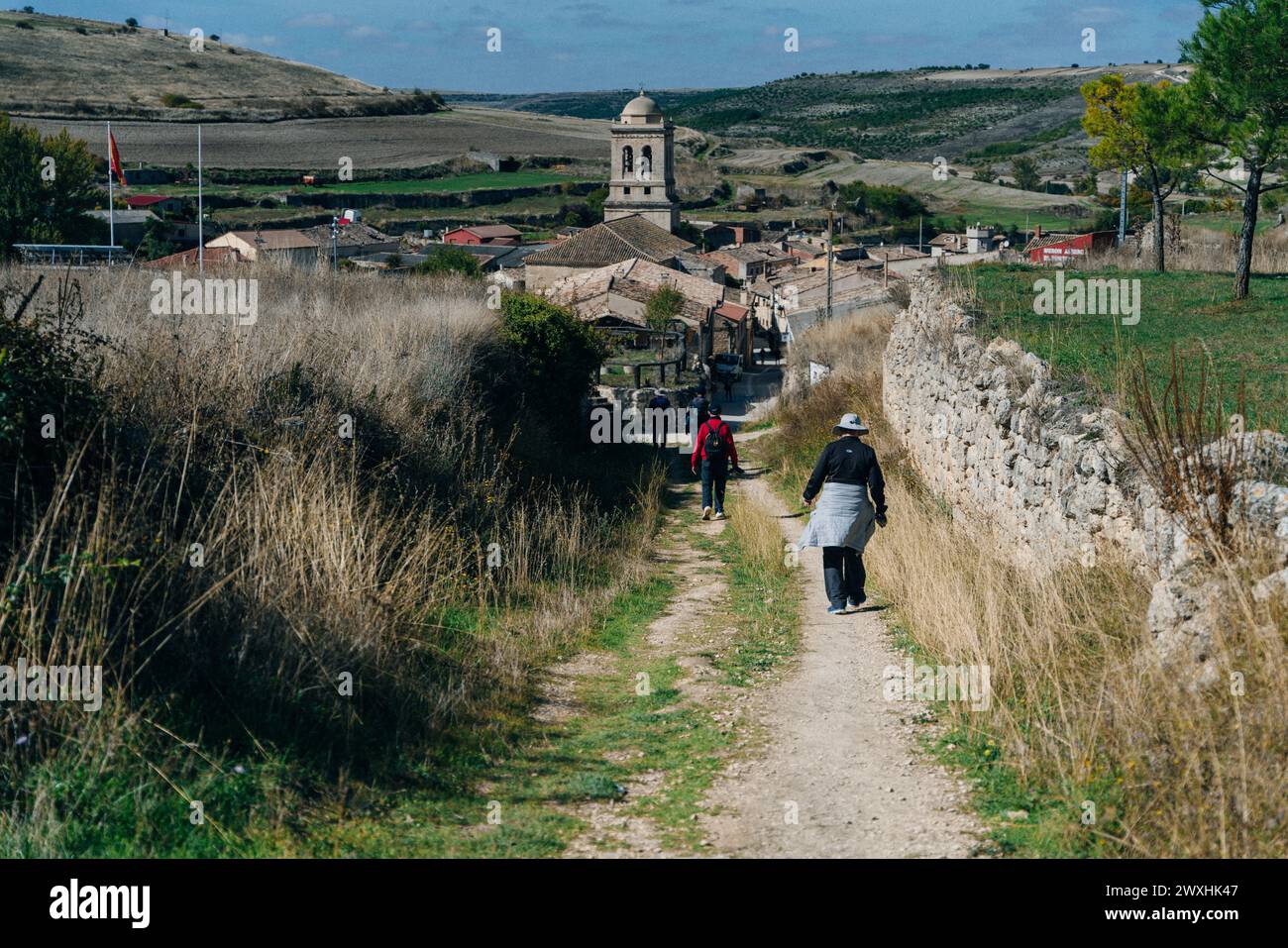 Way Marking Stone Post with Scallop Shell Symbol and Yellow Arrow Sign ...