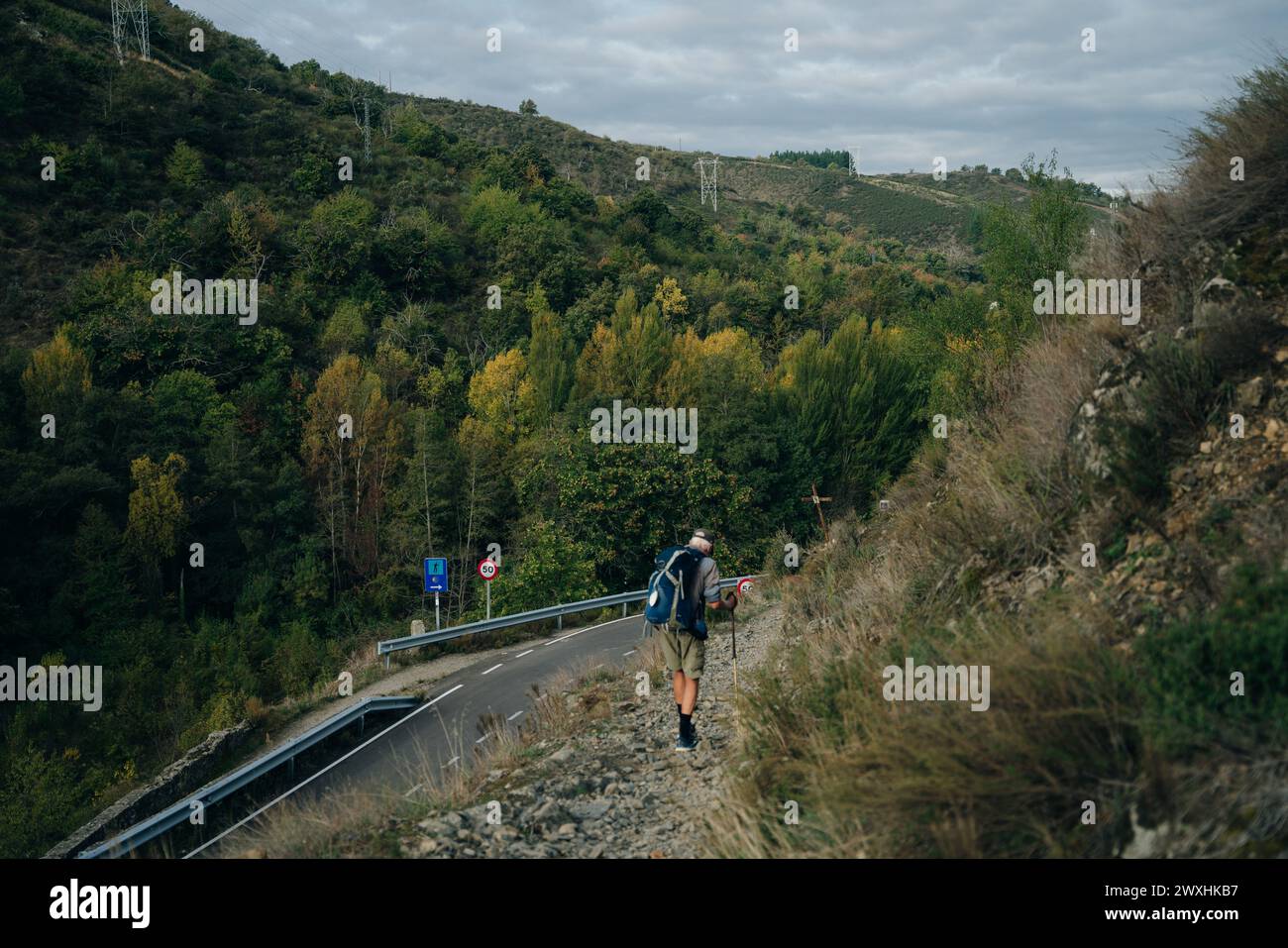 Way Marking Stone Post with Scallop Shell Symbol and Yellow Arrow Sign ...