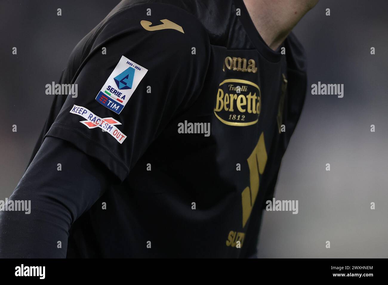 Turin, Italy, 30th March 2024. The Keep Out Racism logo on the sleeve ...