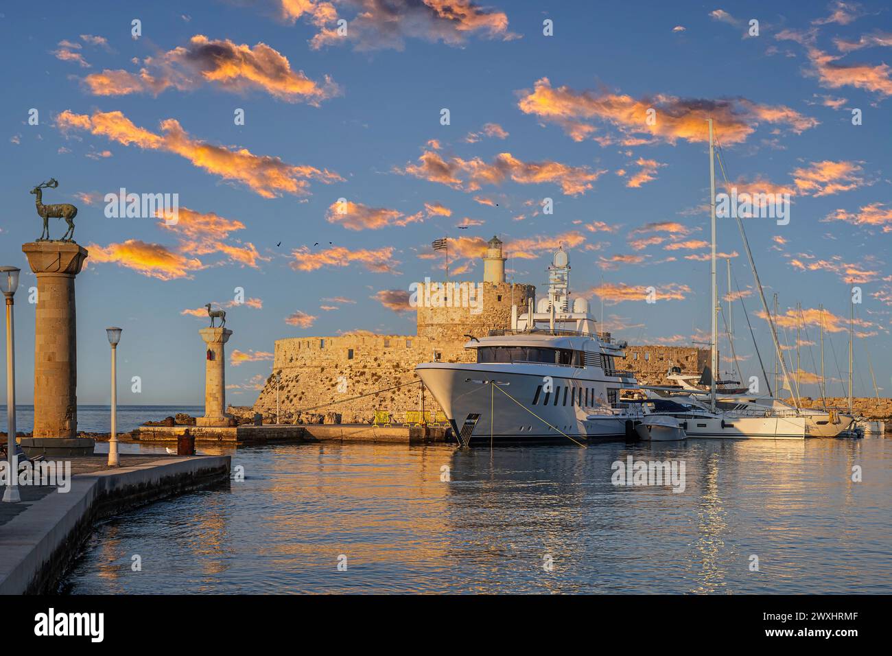Mandraki harbor was the military port of ancient rhodes hi-res stock ...