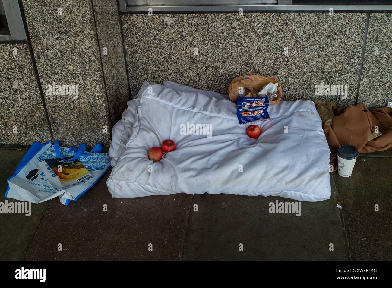 Victoria, London, UK. 26th March, 2024.A homeless person's bedding on a ...