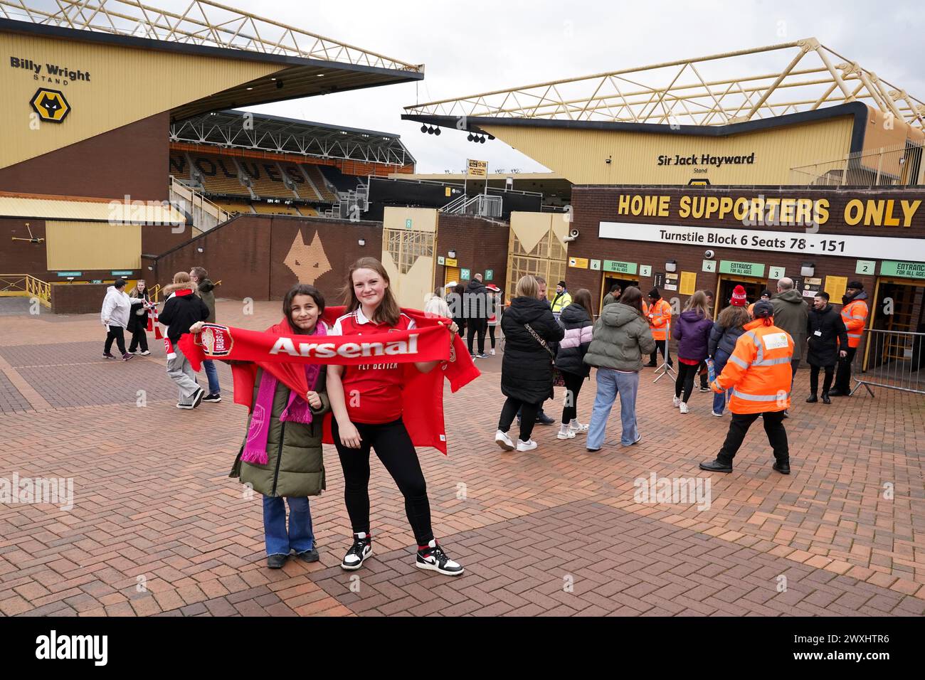 Arsenal fans pose for a photograph outside the stadium ahead of the FA ...