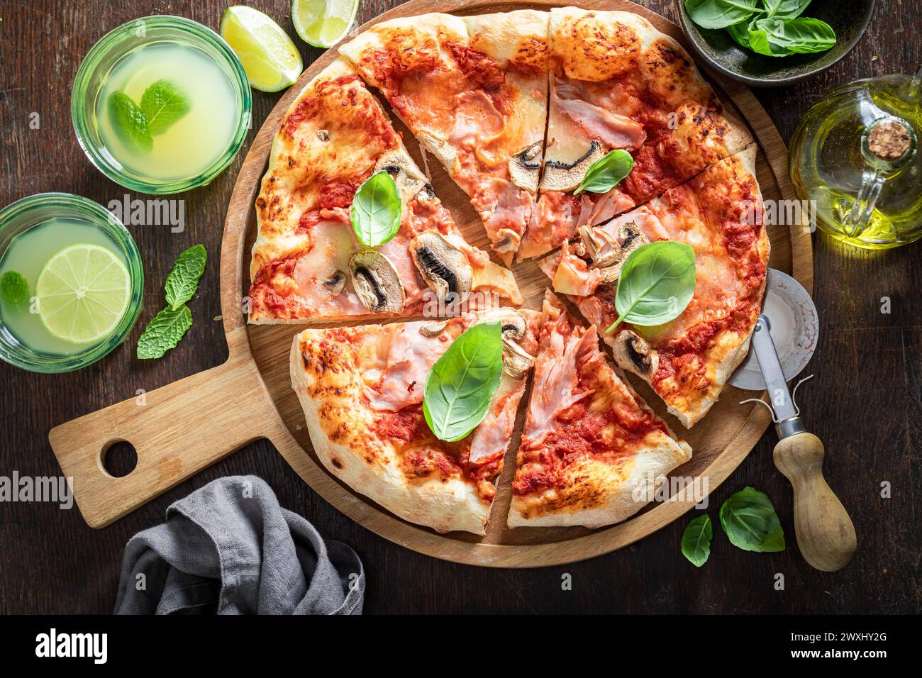 Homemade Capricciosa pizza made of cheese and ham. Classic Italian ...