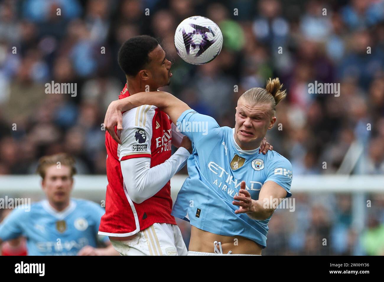 Erling Haaland of Manchester City and Gabriel of Arsenal battle for the ...