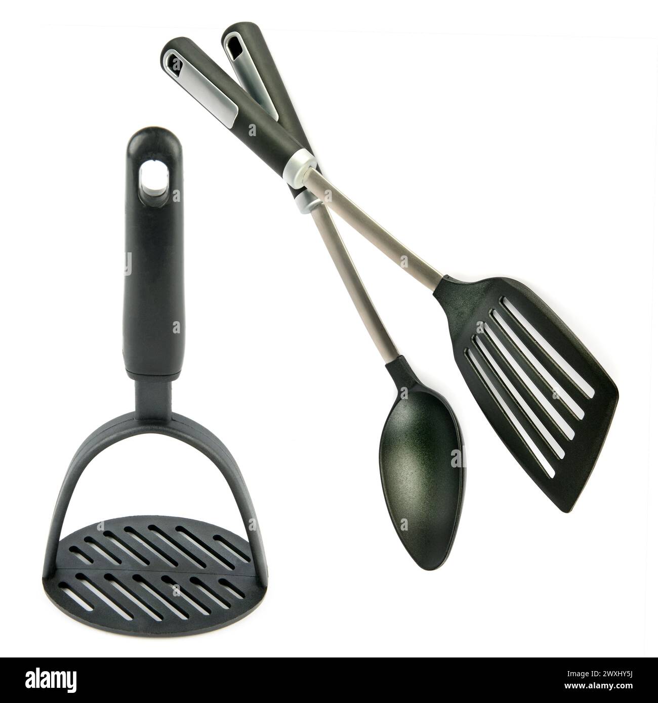 Kitchen spatula, spoon and potato masher isolated on white background ...