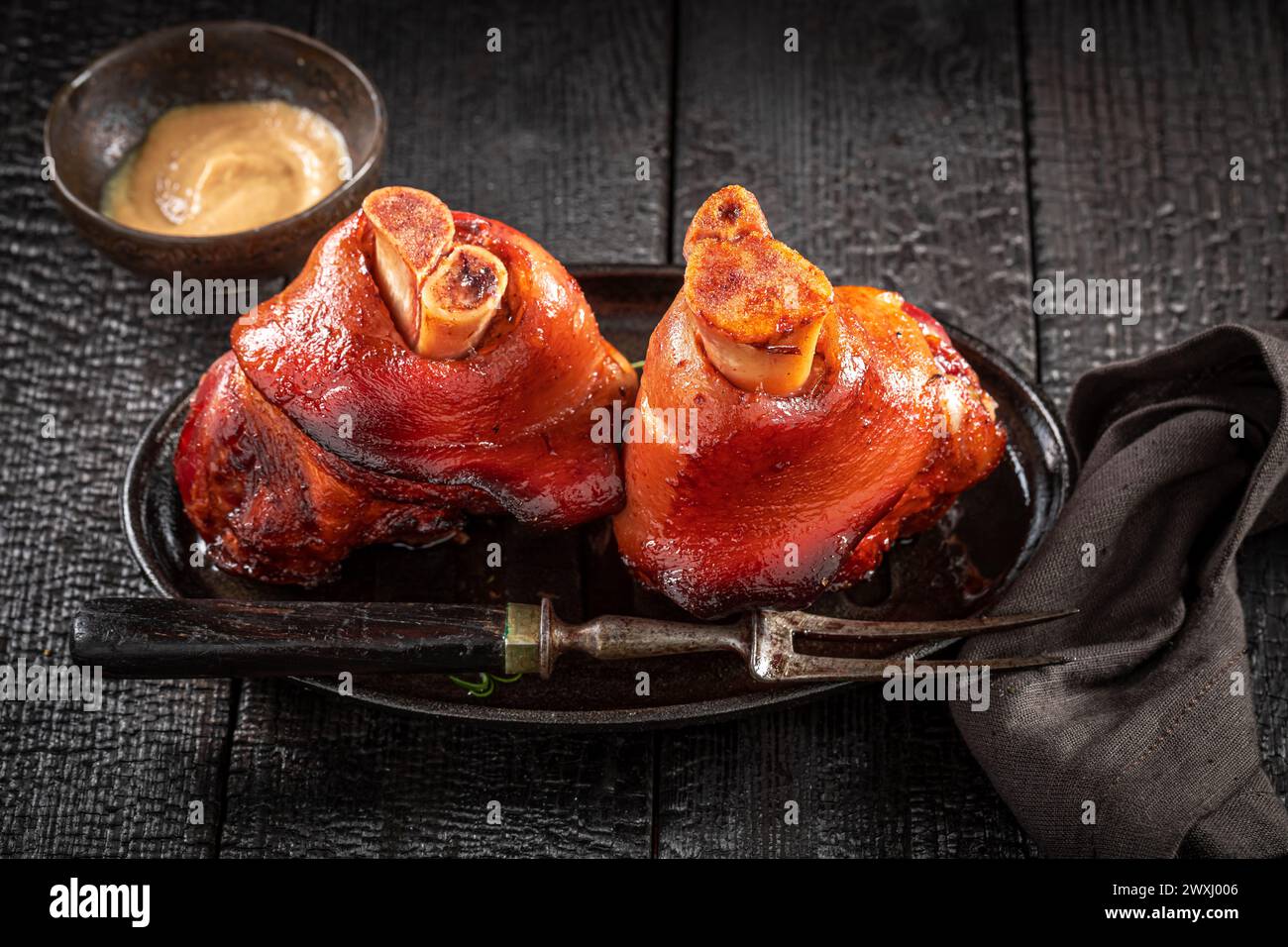 Cripsy and fresh ham hock made of raw meat. Roasted Schweinshaxe with ...