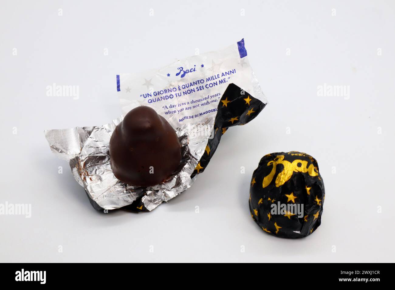 Baci Perugina Chocolate with hazelnut grains and whole hazelnut coated ...