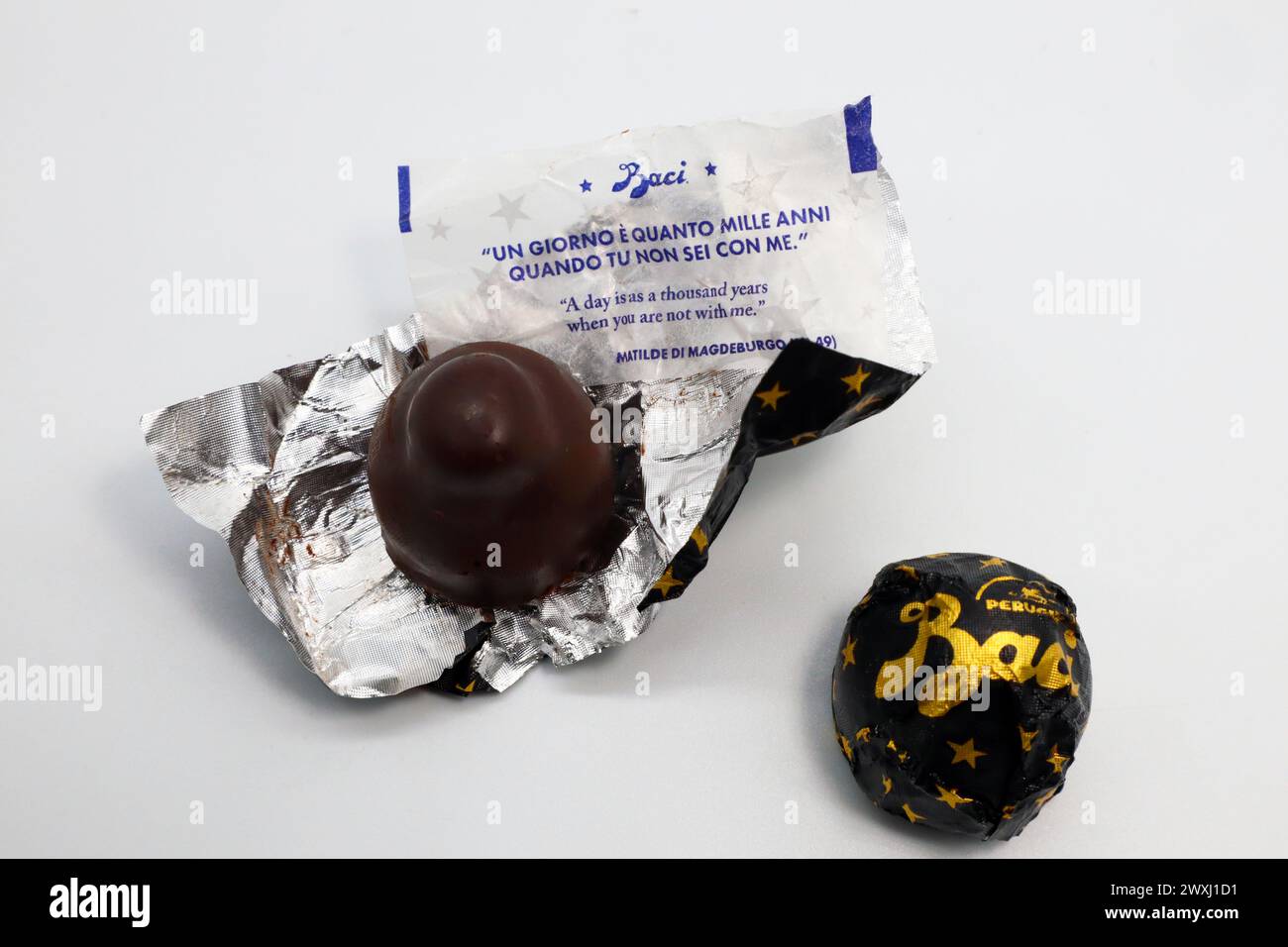 Baci Perugina Chocolate with hazelnut grains and whole hazelnut coated ...