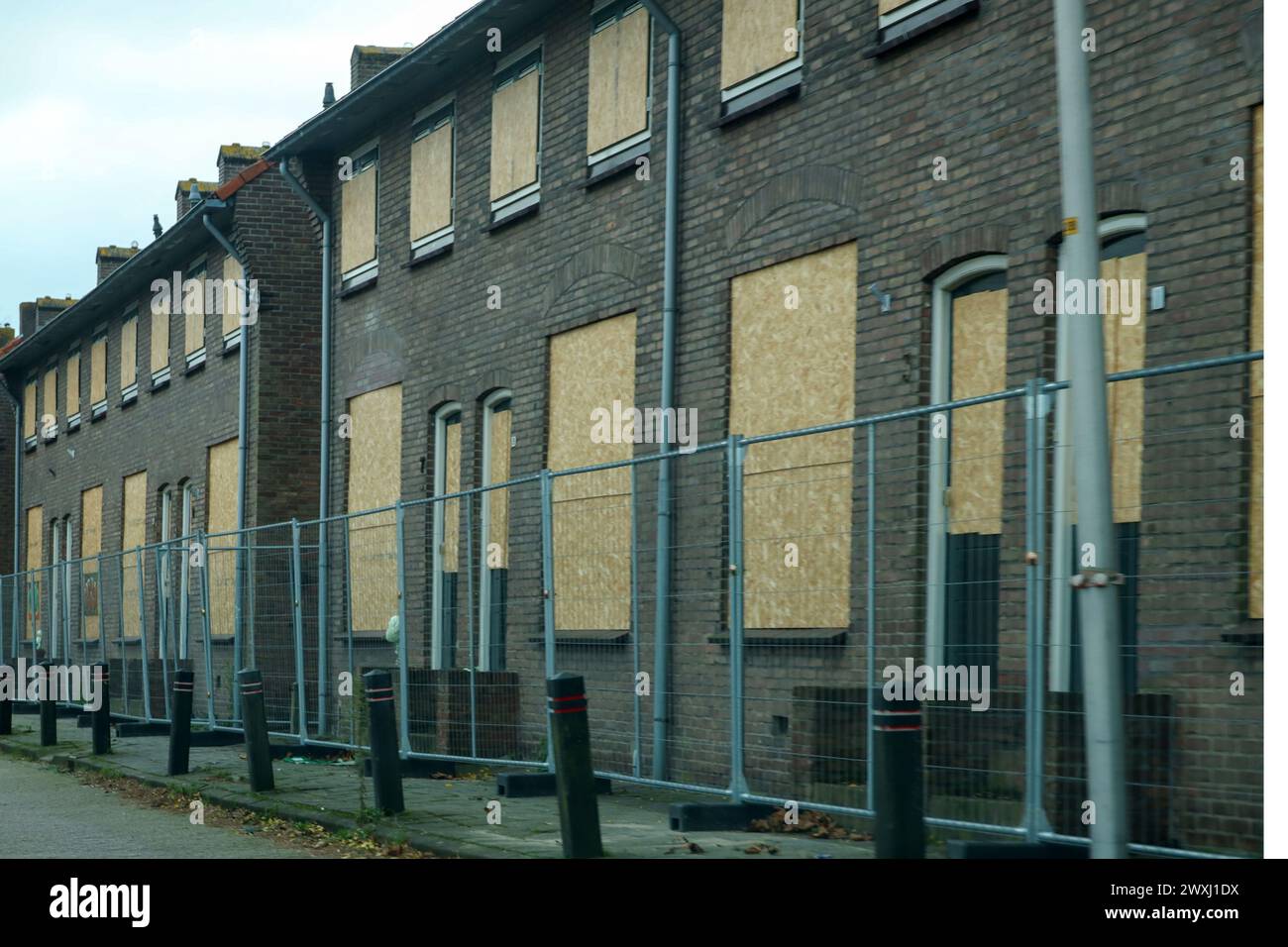 Boarded-up buildings before demolition In the 1950s neighbourhood in ...