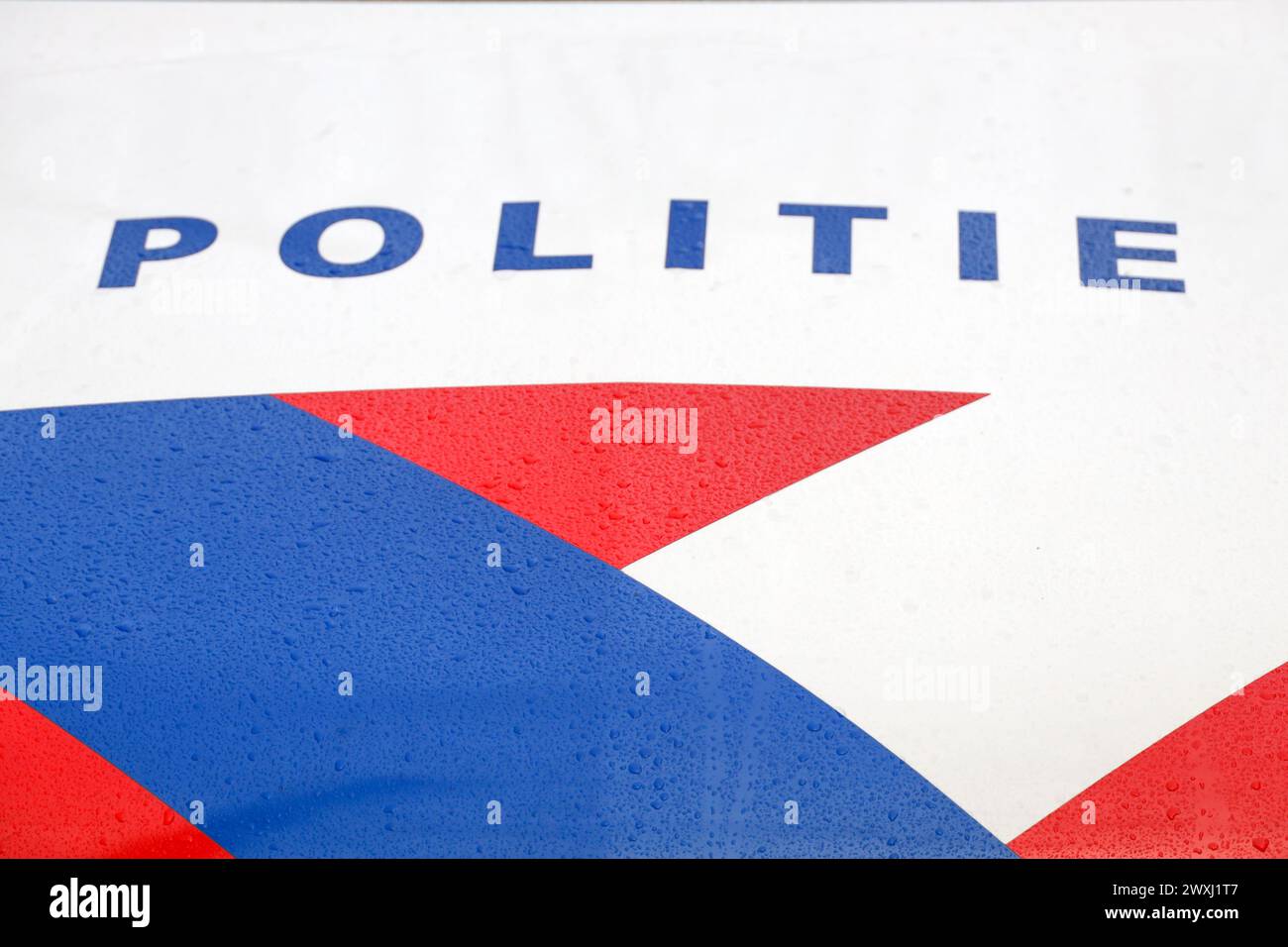 Sign and striping of Politie (Police in dutch) on vehicle in the ...