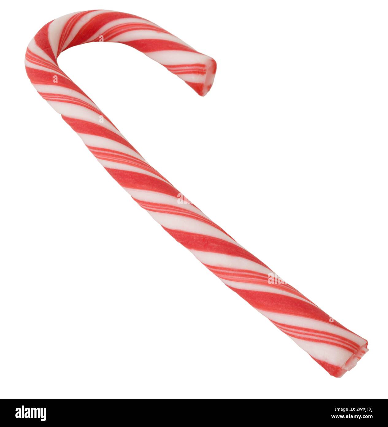 Candy cane at an angle with the curved side furthest from the viewer ...