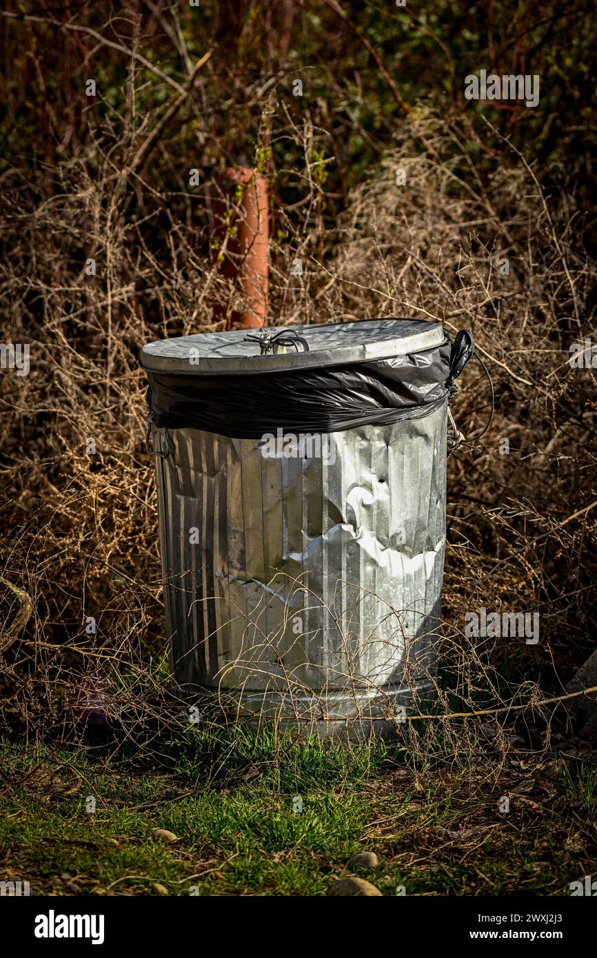 Dented trash can hi-res stock photography and images - Alamy