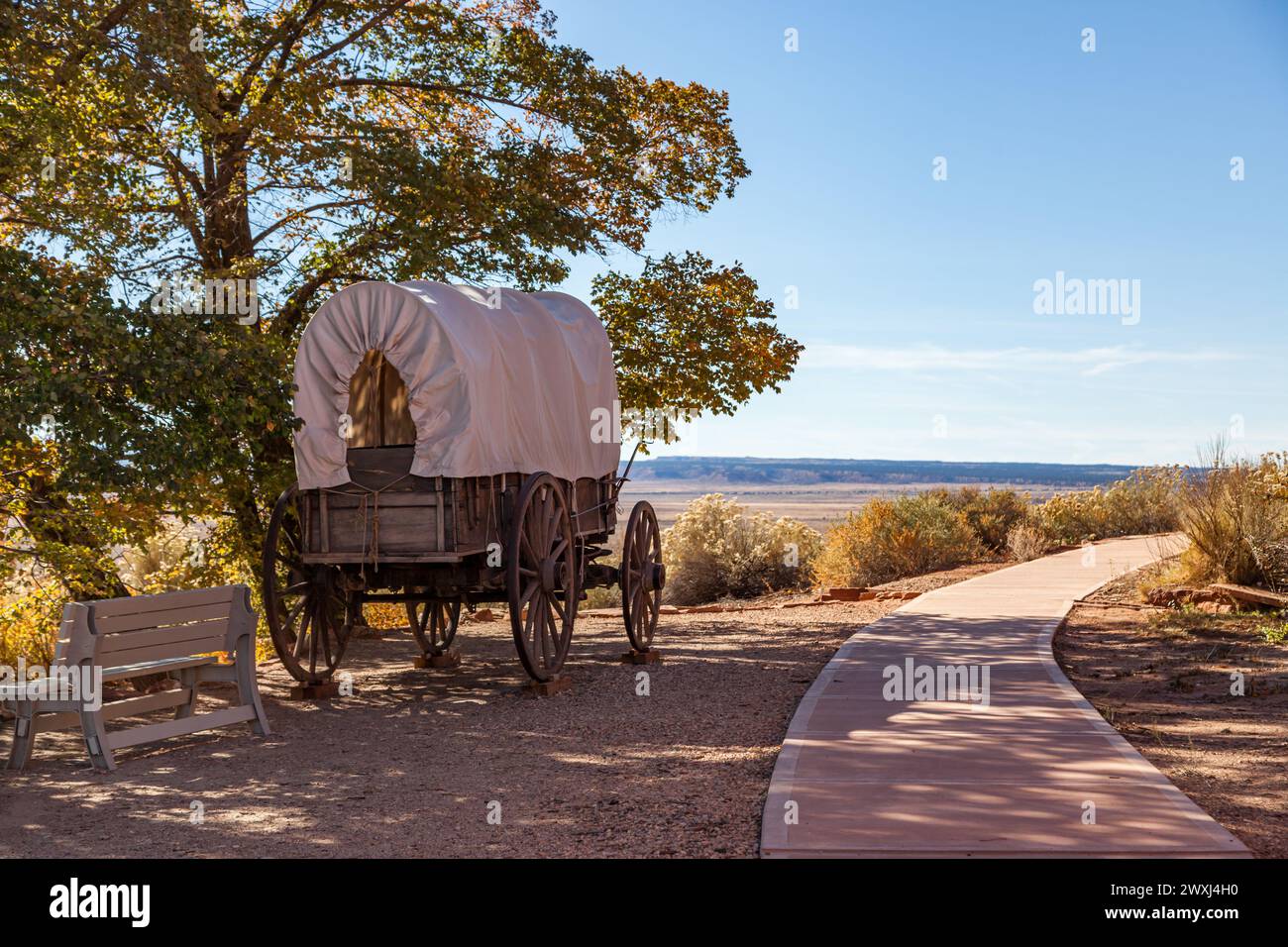 A old wooden covered wagon on display at the historic site of Pipe ...