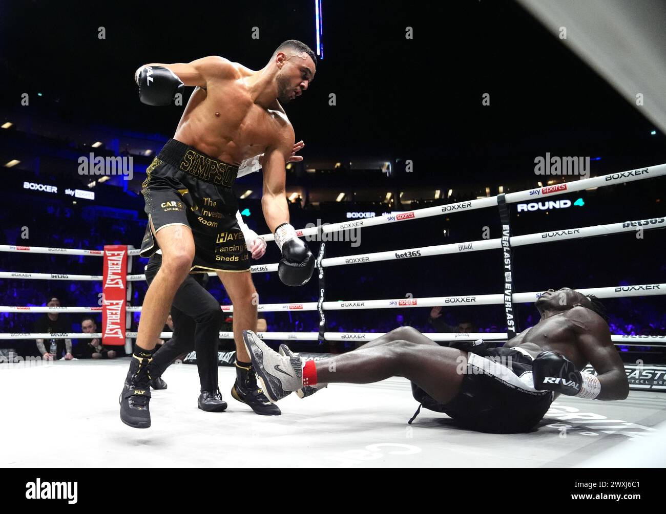 Dulla Mbabe is knocked down during his super middle weight bout against ...
