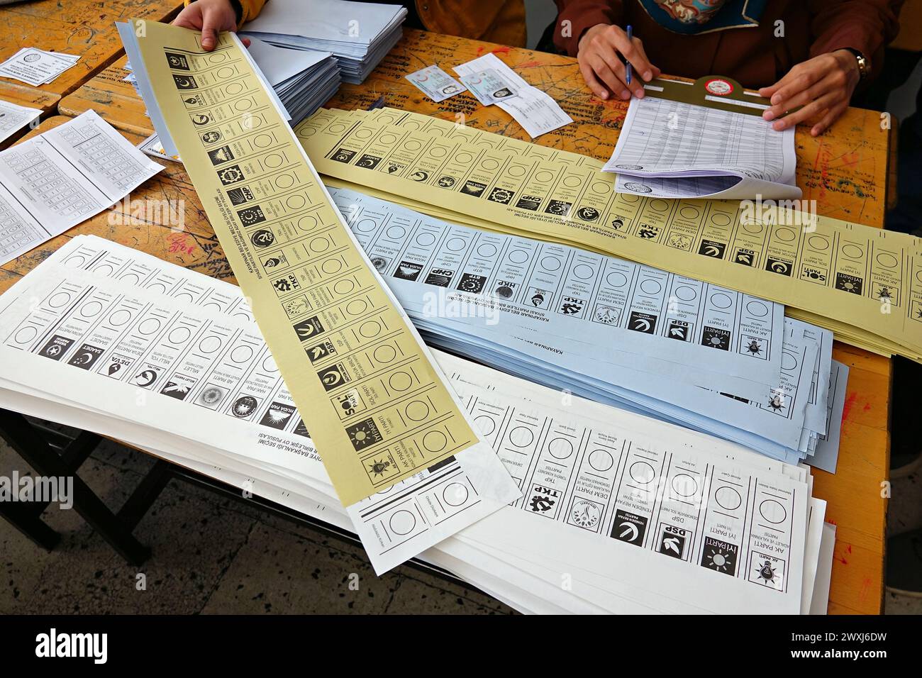 Ballot papers used in the election in Diyarbakir with the emblems of ...