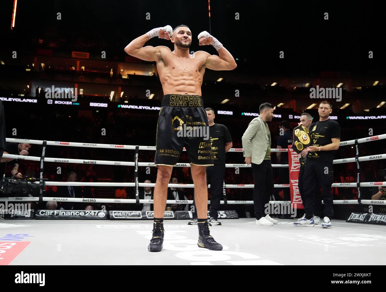 Callum Simpson poses after victory over Dulla Mbabe (not pictured) in ...