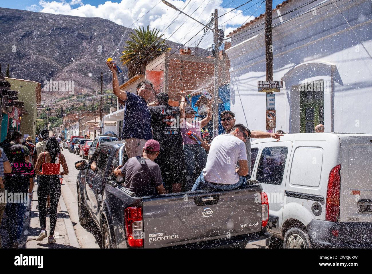 Local Young People In A Truck Spray Foam Over People In The Street ...