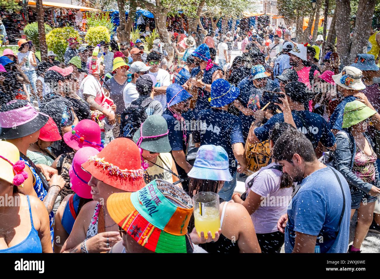 Young People Spraying Foam In The Main Square During The Annual ...