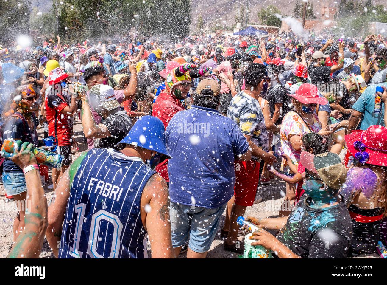 Carnival Revellers Spraying Foam At The Annual Tilcara Carnival, Jujuy ...