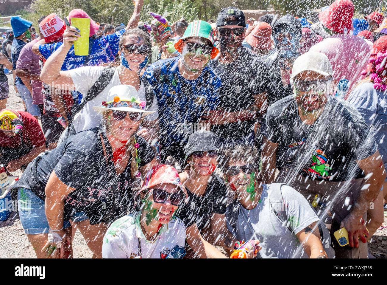 Carnival Revellers Spraying Foam At The Annual Tilcara Carnival, Jujuy ...