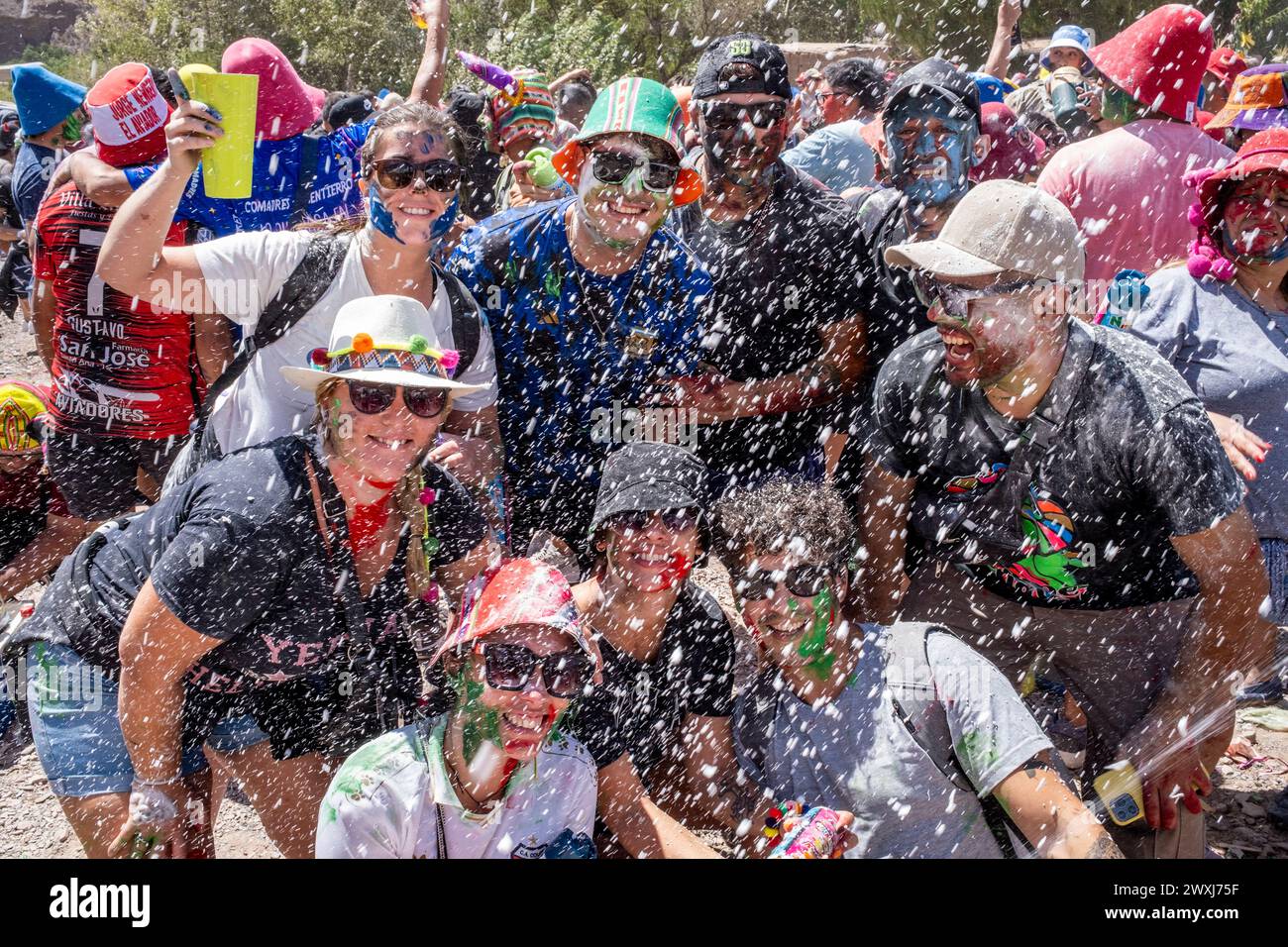 Carnival Revellers Spraying Foam At The Annual Tilcara Carnival, Jujuy ...