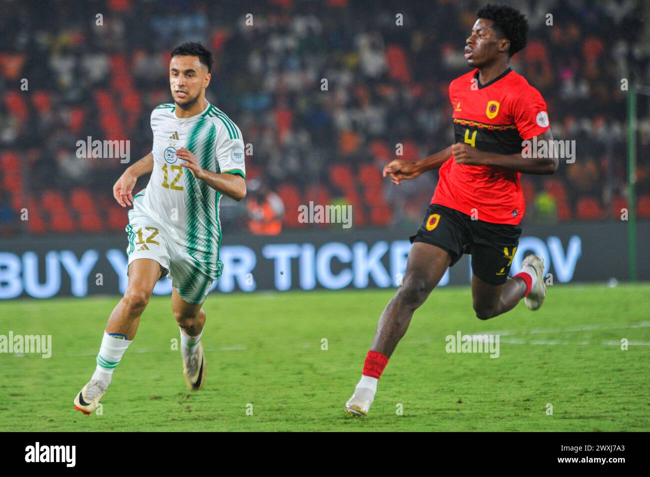 ABIDJAN, COTE D'IVORE - JANUARY 15; Adam Ounas of Algeria and Manuel ...