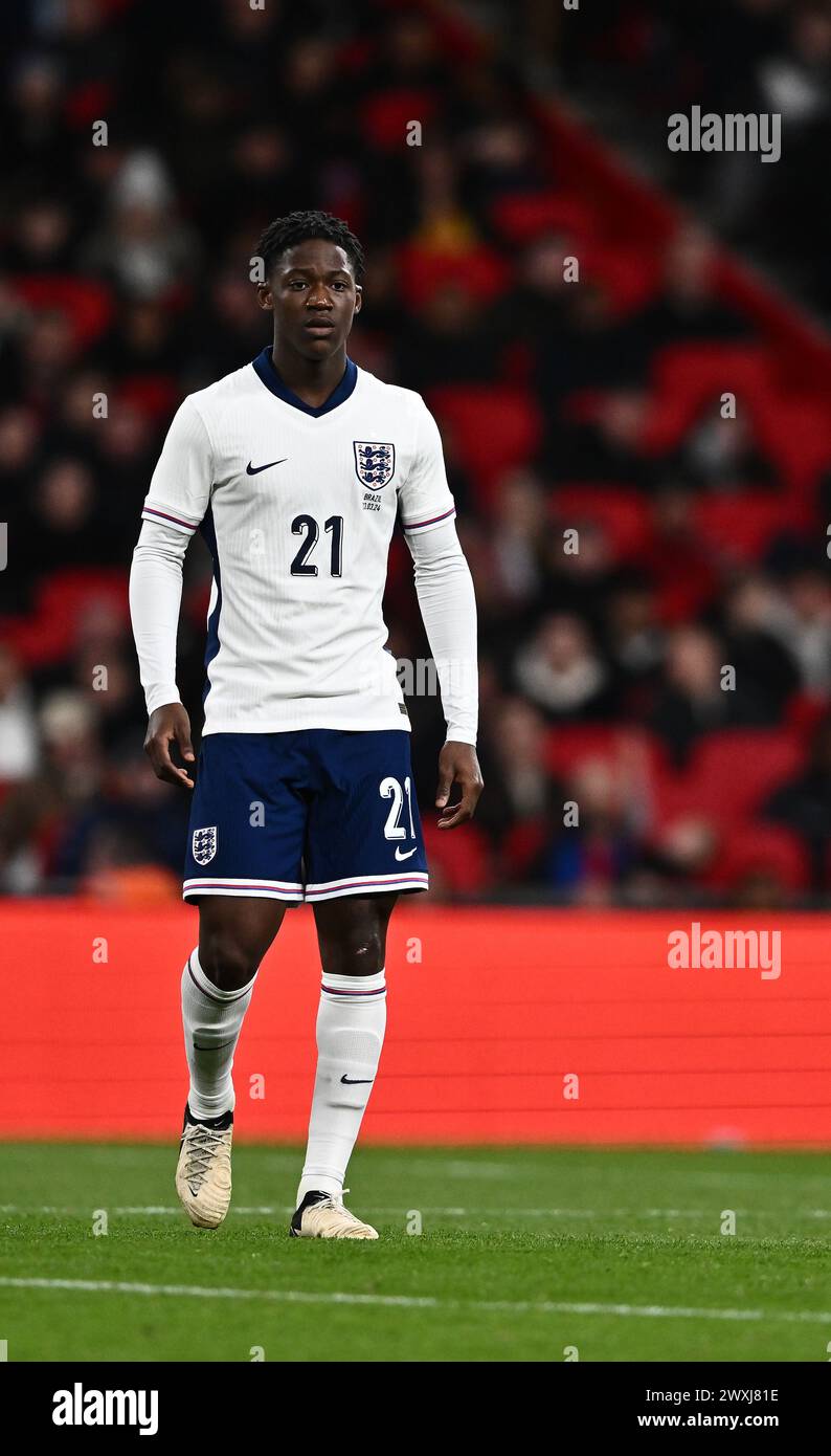 LONDON, ENGLAND - MARCH 23: Kobie Mainoo of England in home kit, full ...