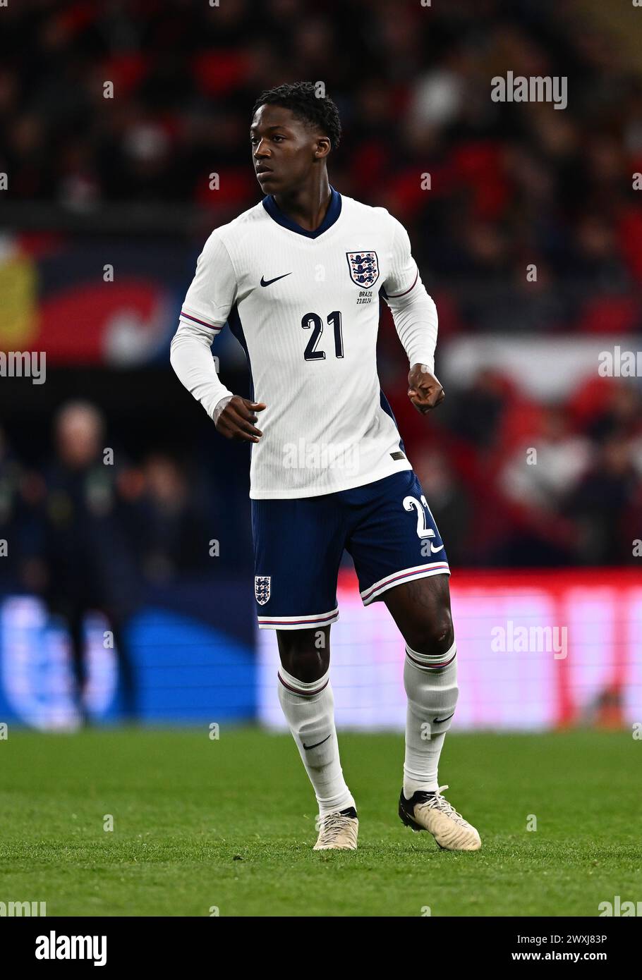 LONDON, ENGLAND - MARCH 23: Kobie Mainoo of England in home kit, full ...