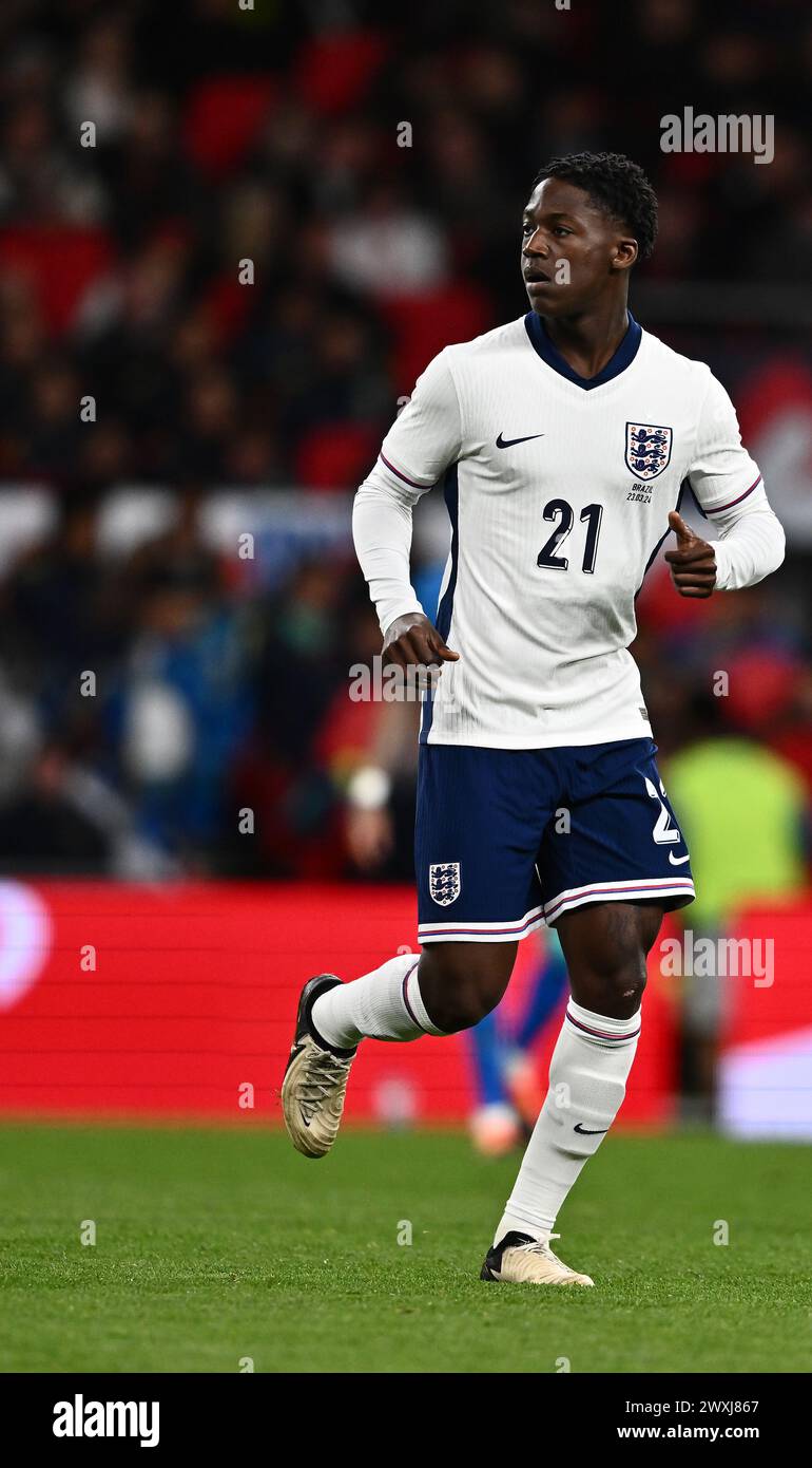 LONDON, ENGLAND - MARCH 23: Kobie Mainoo of England in home kit, full ...