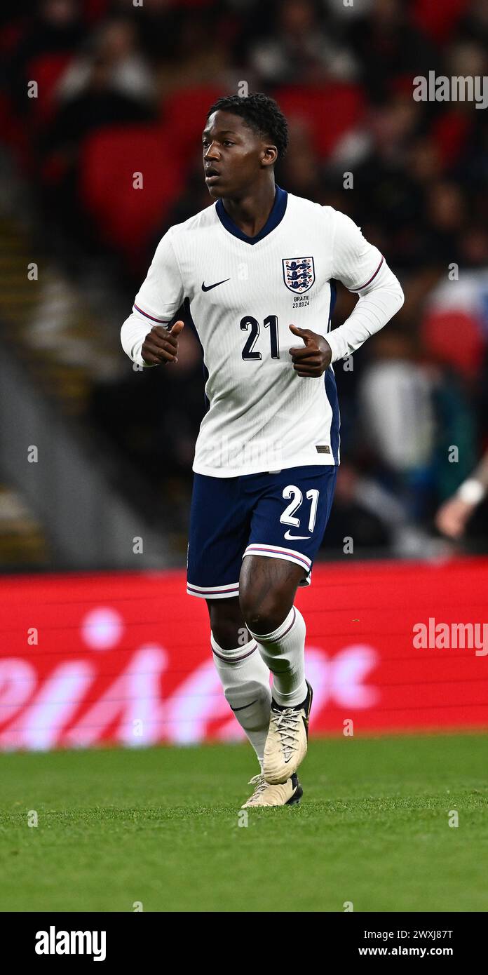 LONDON, ENGLAND - MARCH 23: Kobie Mainoo of England in home kit, full ...