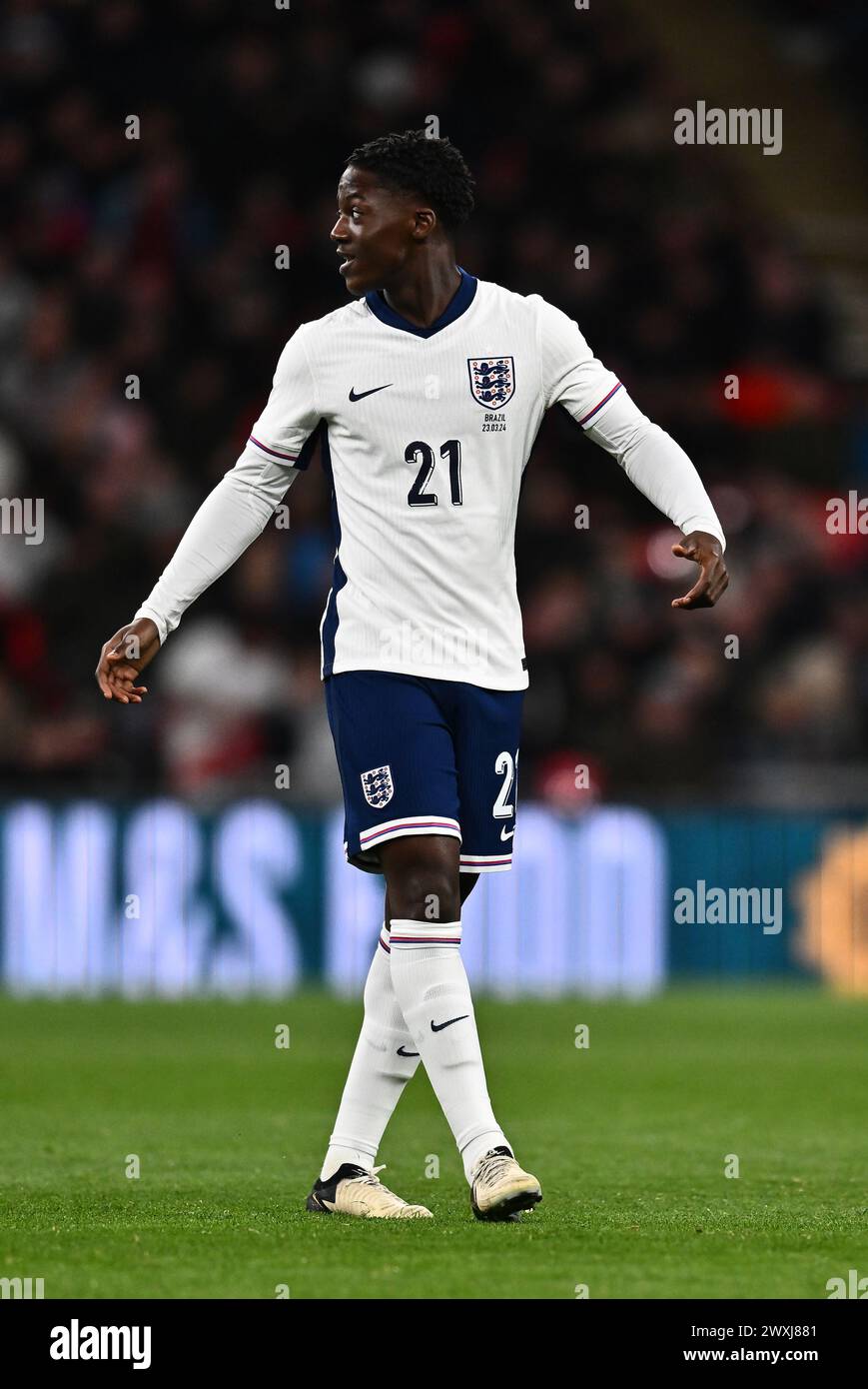 LONDON, ENGLAND - MARCH 23: Kobie Mainoo of England in home kit, full ...