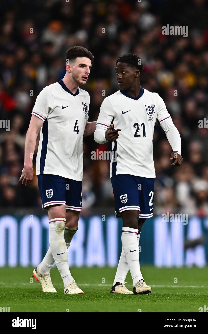 LONDON, ENGLAND - MARCH 23: Decland Rice and Kobie Mainoo of England ...
