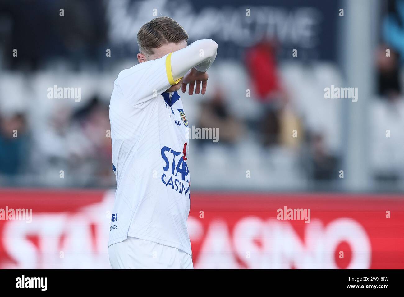 Liege, Belgium. 31st Mar, 2024. Beveren's Mathis Servais looks dejected ...