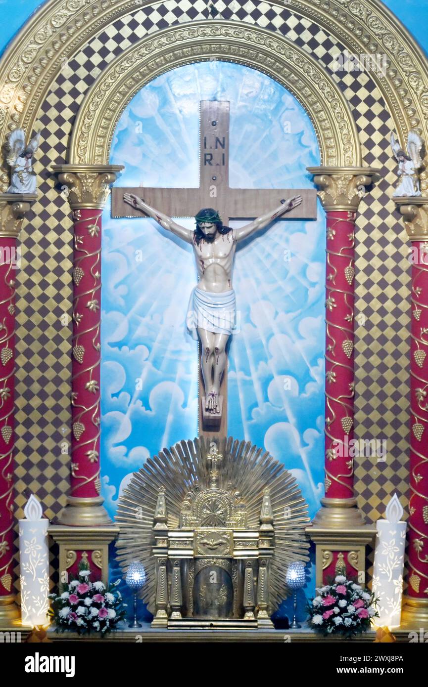 NOIDA, INDIA - MARCH 31: Priest leads prayers on the occasion of Easter ...