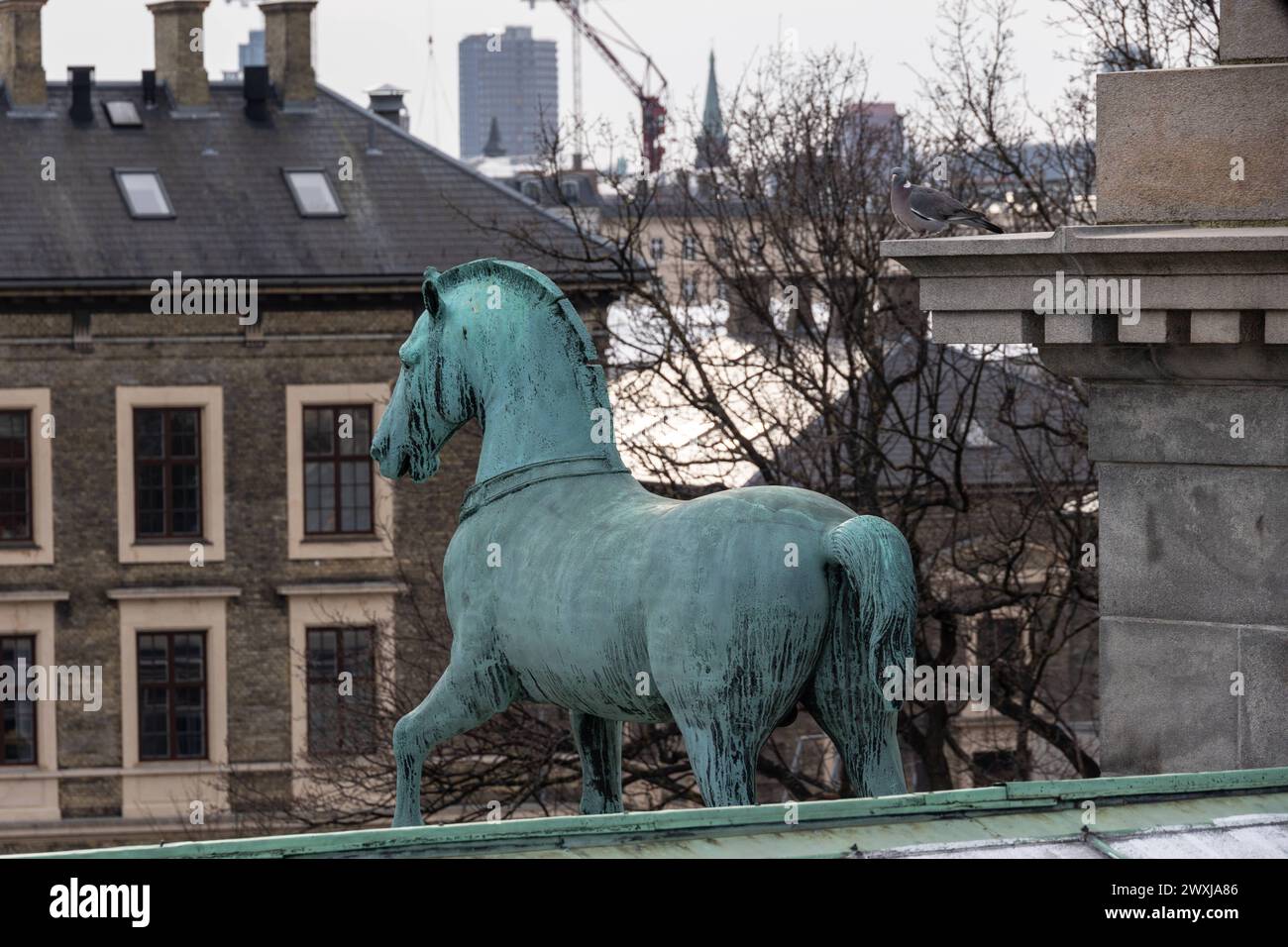 A bronze sculpture of a horse on the roof of the Glyptoteket Copenhagen ...