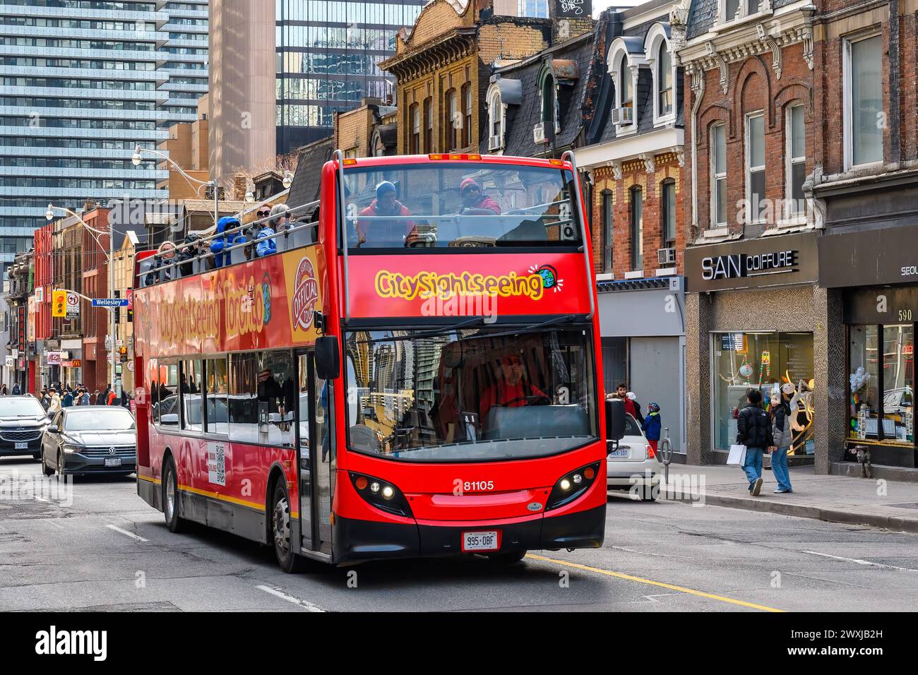 A double-decker Sightseeing tourist bus in Yonge St., Toronto, Canada ...