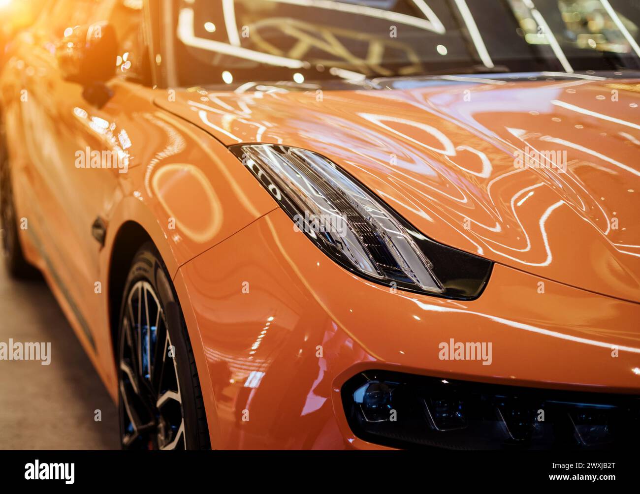 Modern fast car. Front view headlamp luxury auto Stock Photo - Alamy