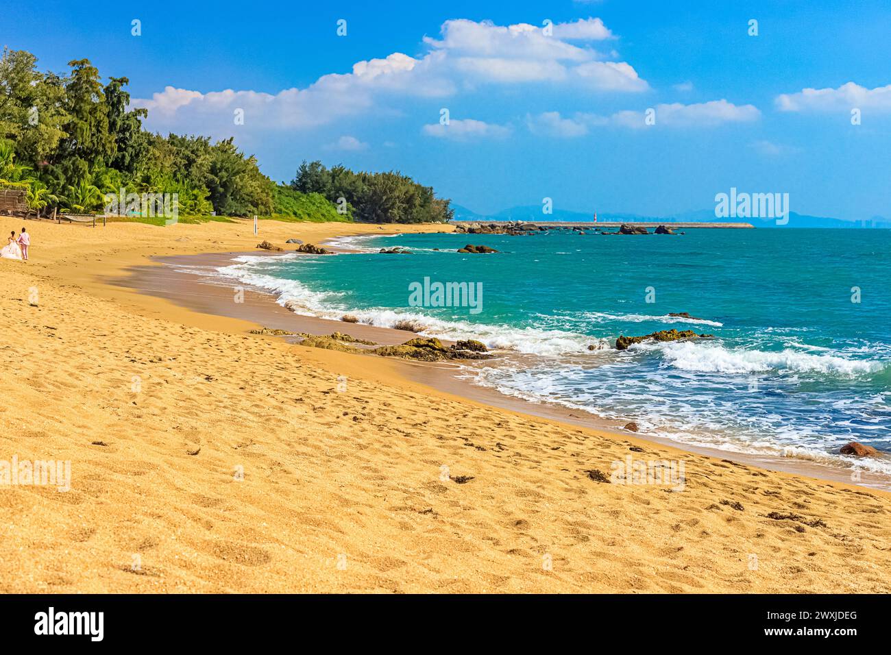 View of the shore of the South China Sea with a sandy beach and large ...