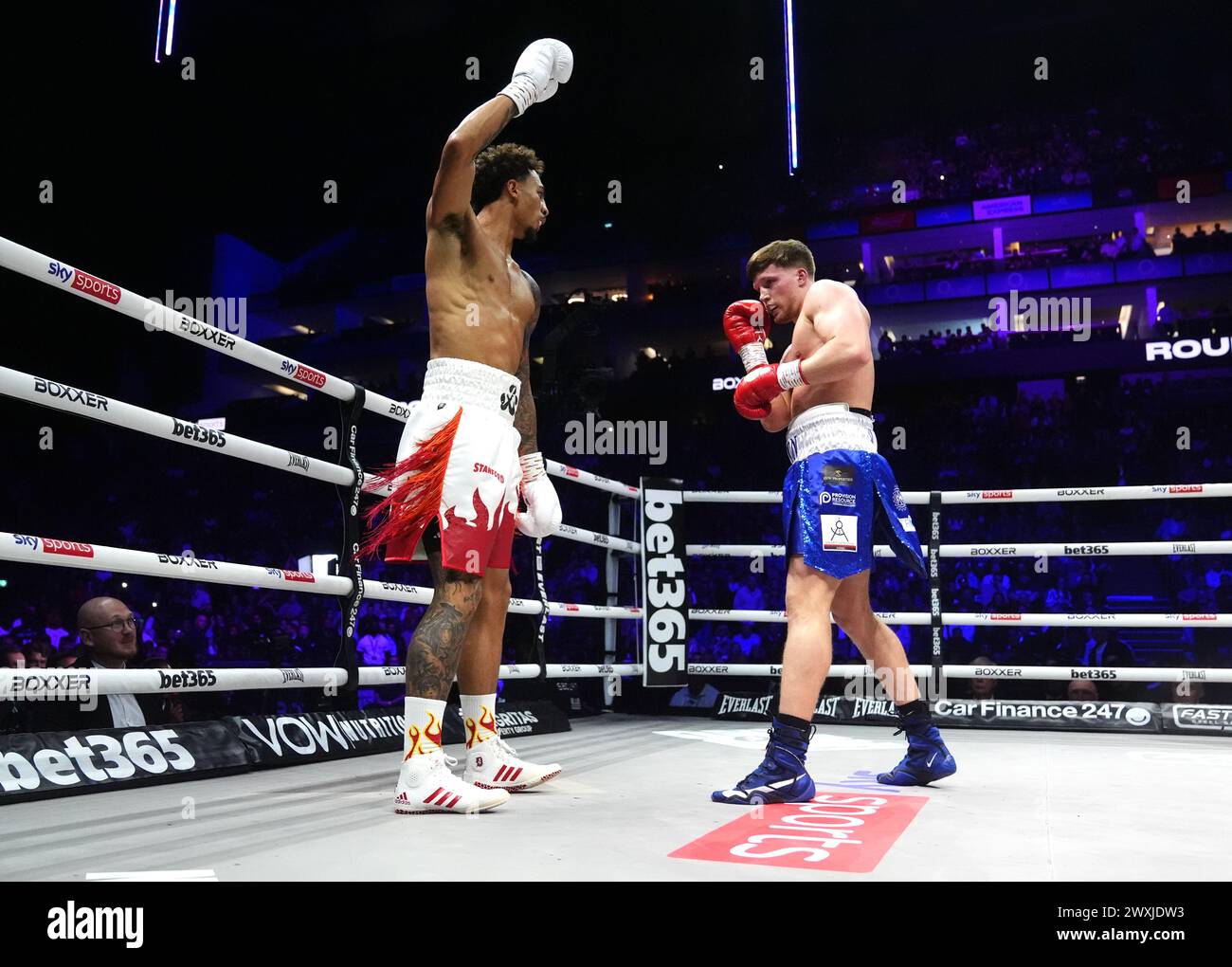 Ben Whittaker (left) and Leon Willings in action during their light ...