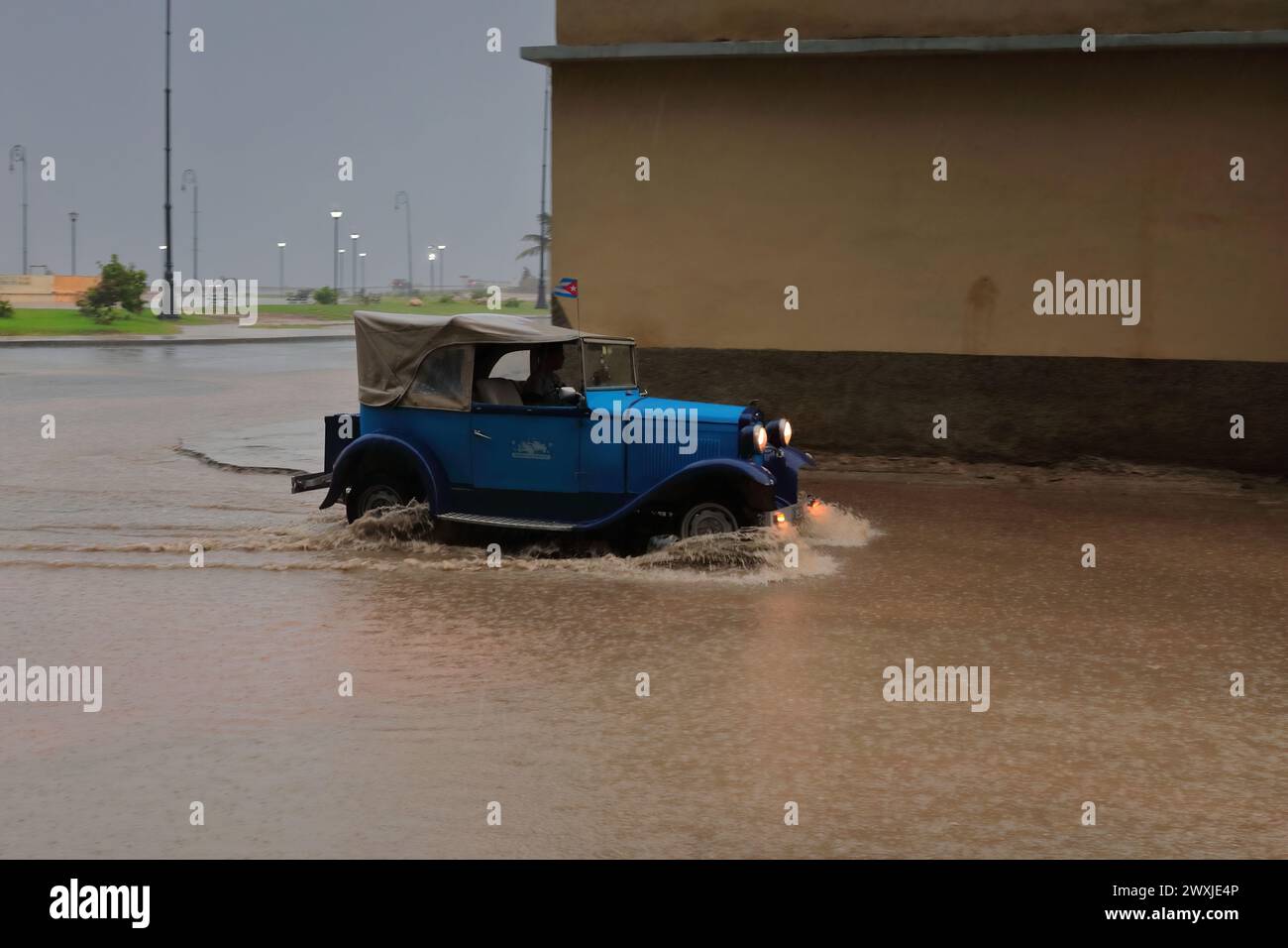 123 Old blue almendron car -Ford classic from 1931- drives down Marina ...