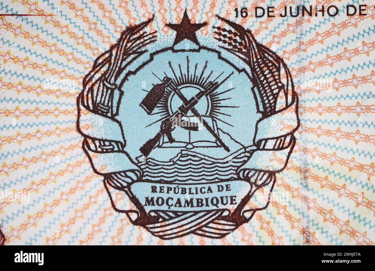 Mozambique Coat of arms national emblem on old Metical currency ...